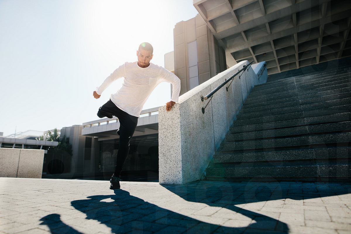 Fit urban guy performing a wall spin – Jacob Lund Photography Store ...