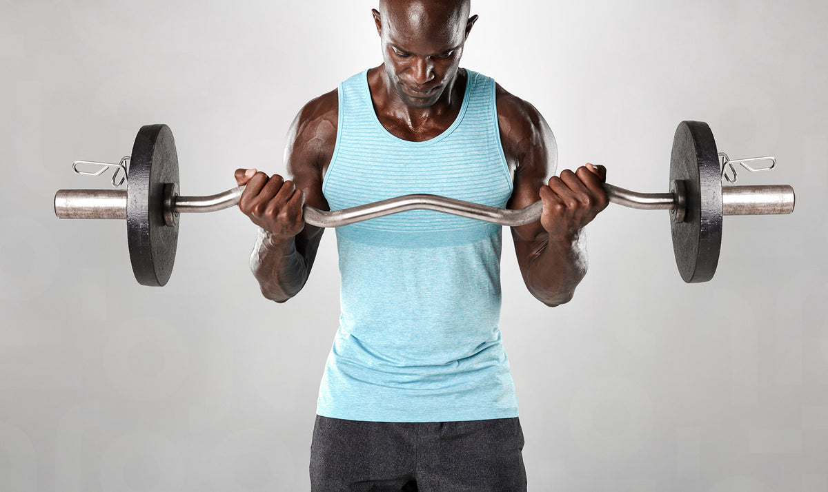 Muscular man exercising with weights – Jacob Lund Photography Store ...