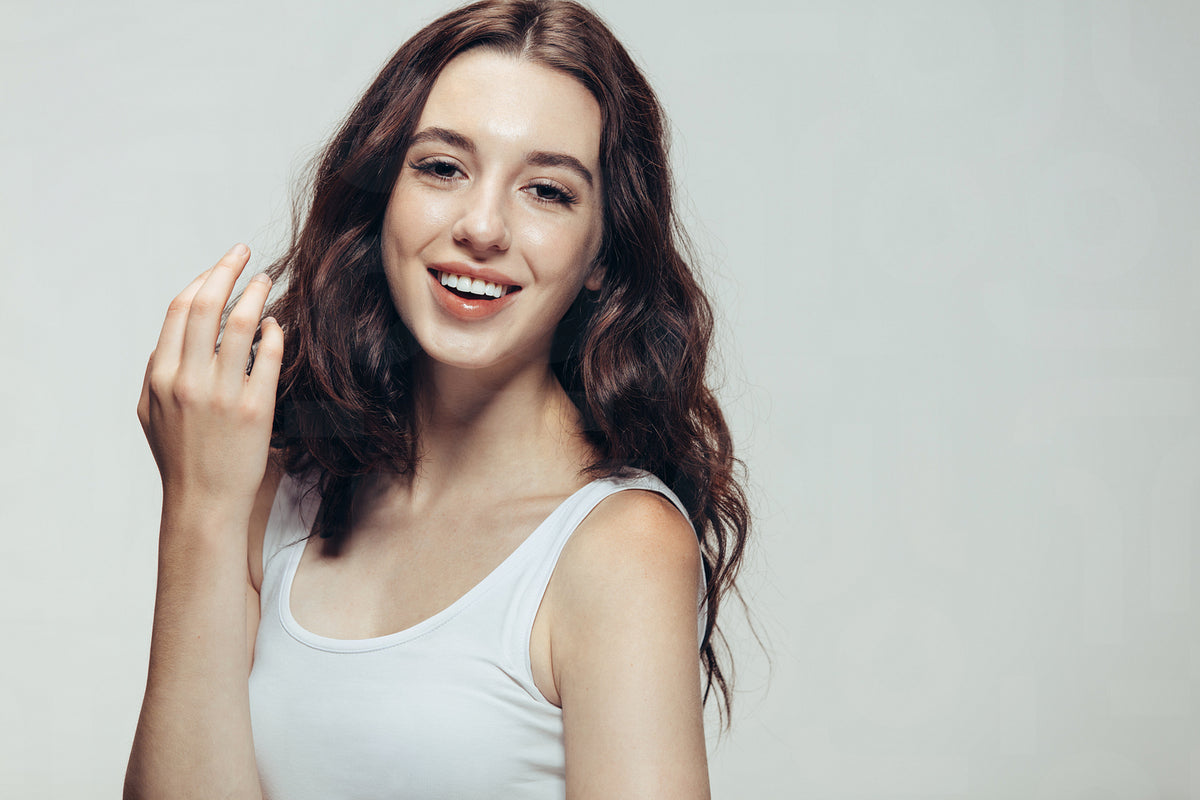 Beautiful young woman smiling – Jacob Lund Photography Store- premium ...