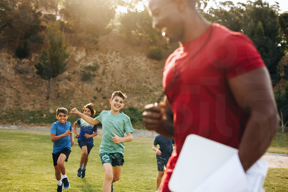 Children running on a school ground during PE – Jacob Lund Photography ...