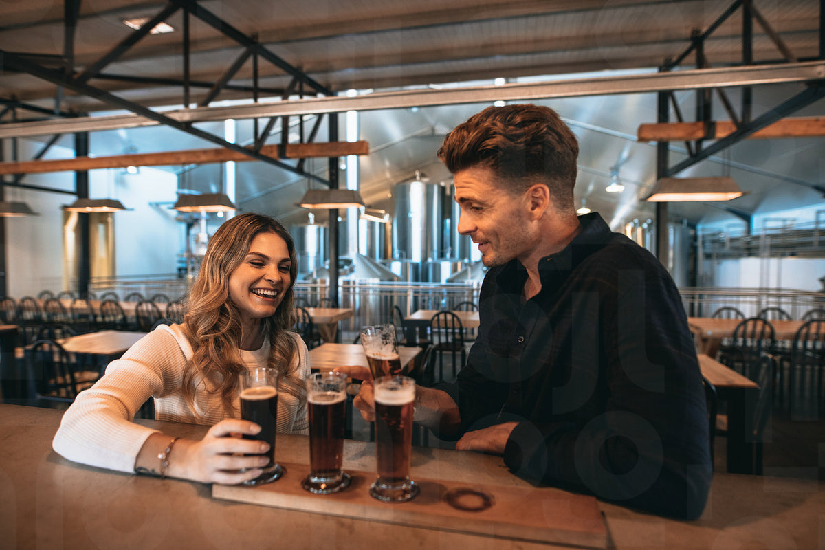 Brewery owners tasting varieties of beers at the bar – Jacob Lund ...