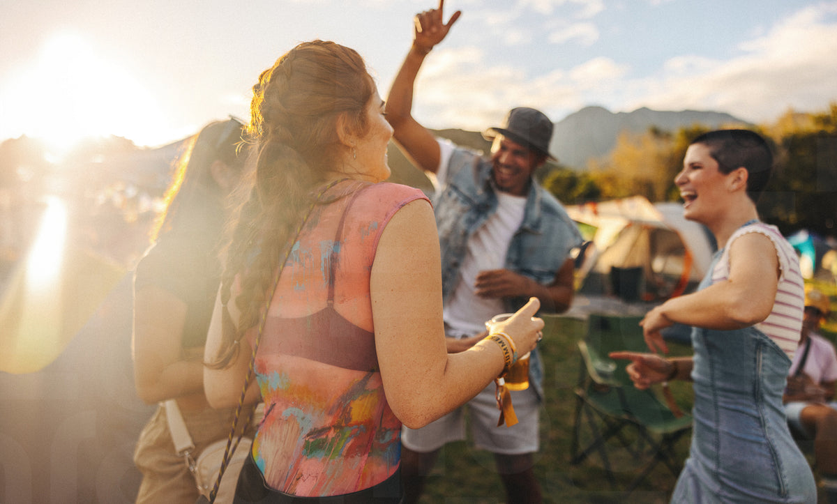 Friends embrace the festive spirit, dancing and celebrating together a ...