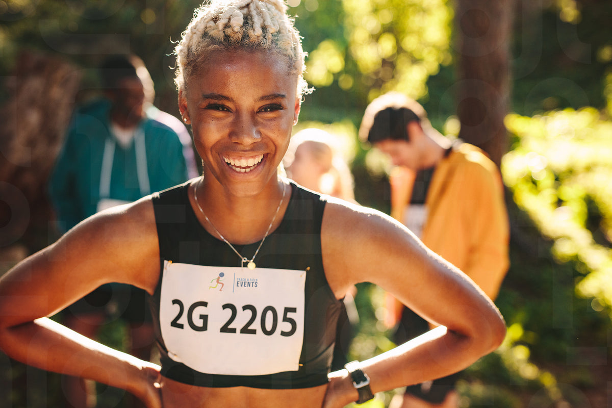 Smiling female cross country runner – Jacob Lund Photography Store ...