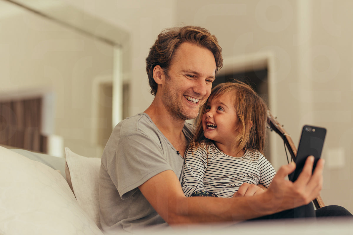 Father and daughter spending time together at home – Jacob Lund ...