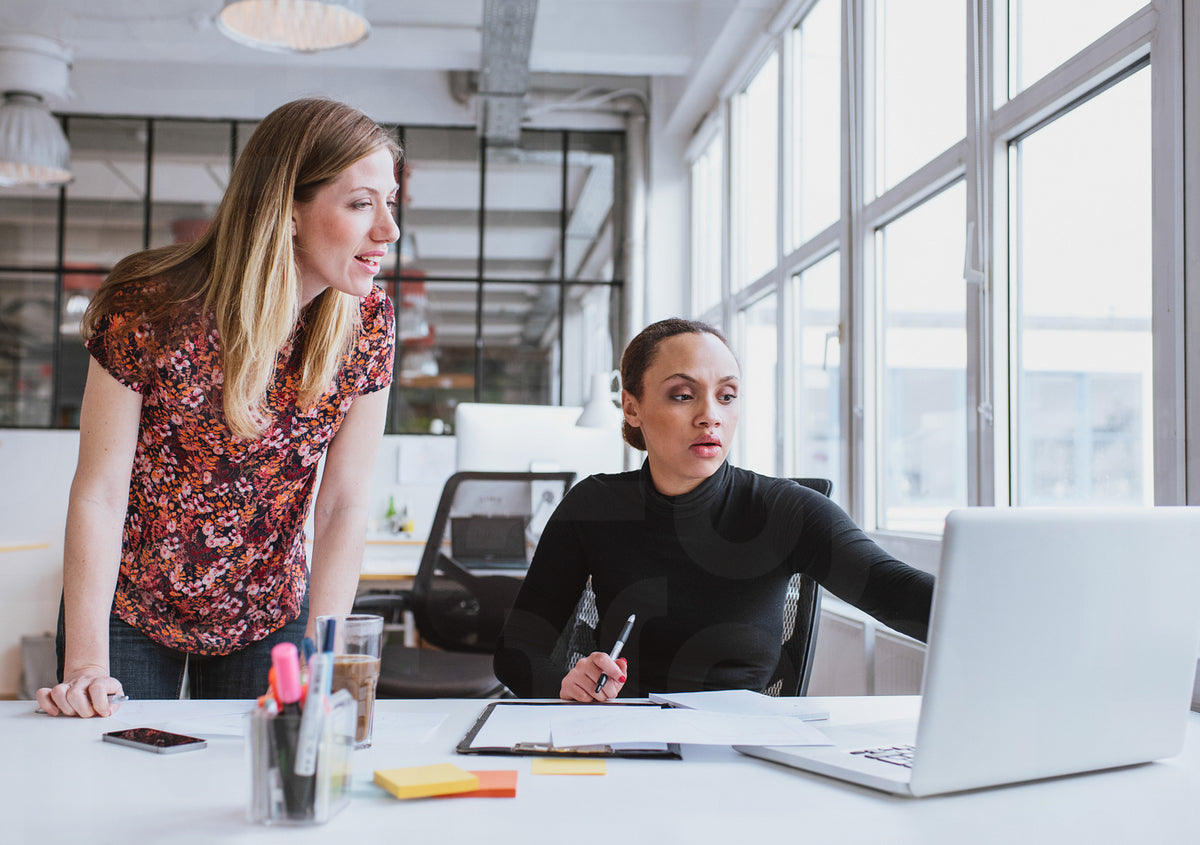 Female executives working together on new project – Jacob Lund ...