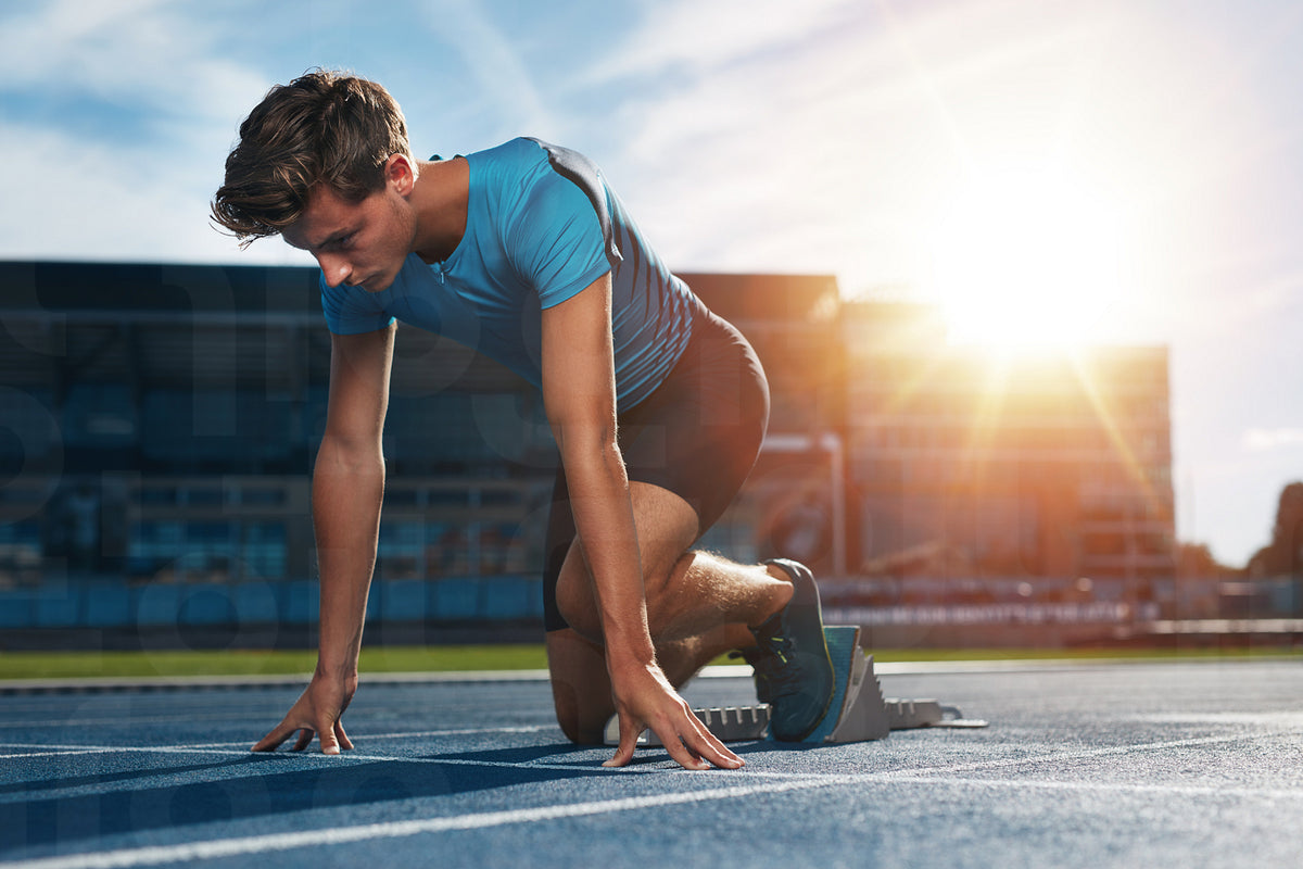 Athlete at starting block on running track – Jacob Lund Photography ...