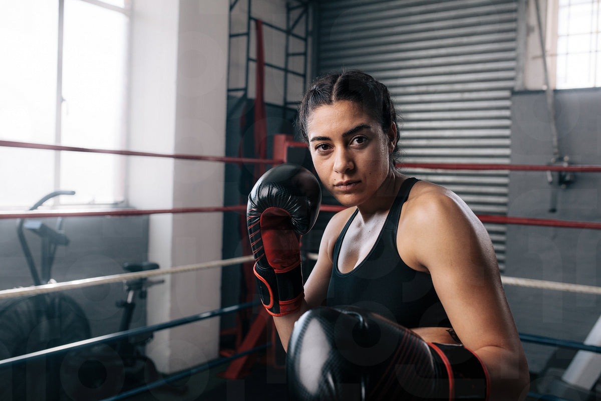 Female boxer training inside a boxing ring – Jacob Lund Photography ...