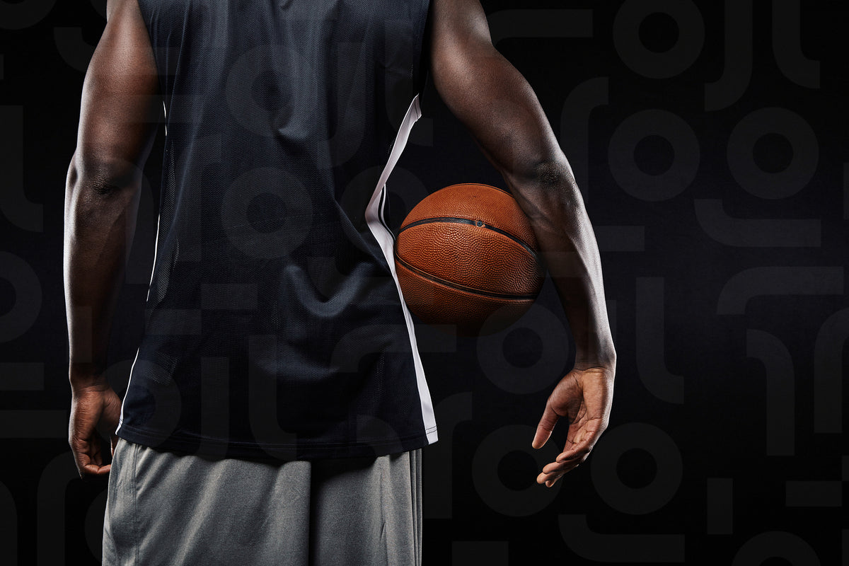 African basketball player with a ball in his arm – Jacob Lund ...