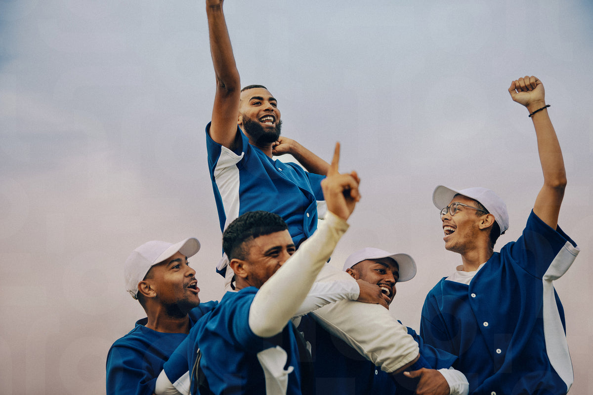 Joyful baseball team celebrating victory with teamwork and unity under ...