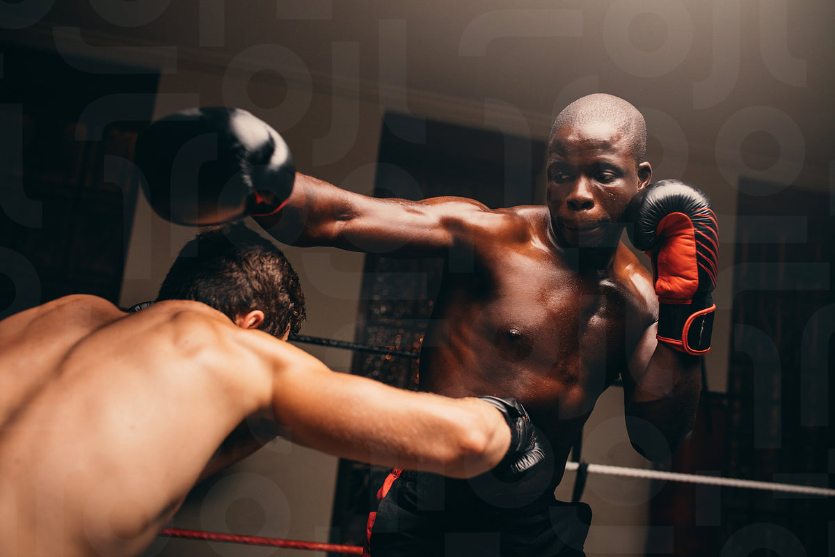 Two male fighters having a match in a boxing ring – Jacob Lund ...
