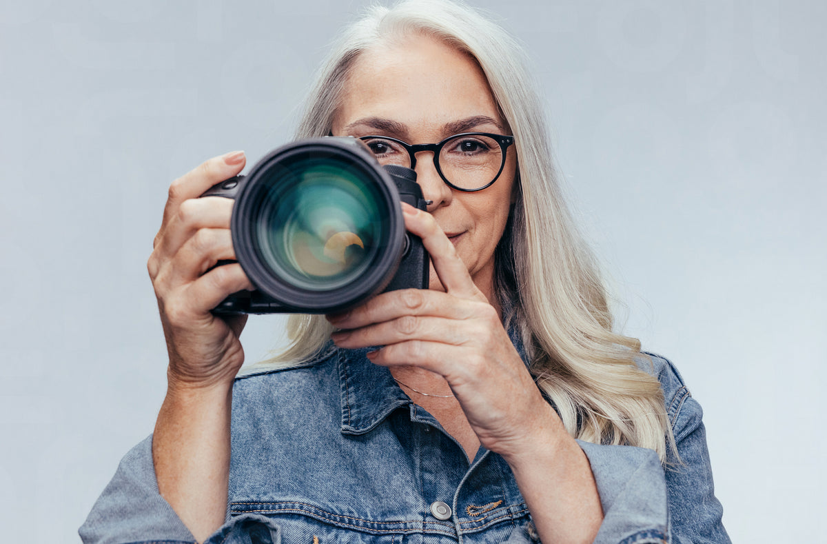 Professional female photographer doing a photoshoot – Jacob Lund ...