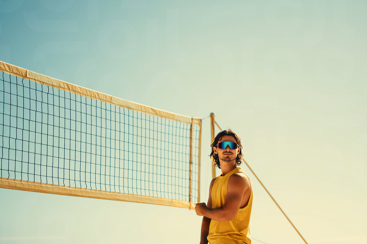 Pro volleyball player soaking up the summer sun on the beach during a ...
