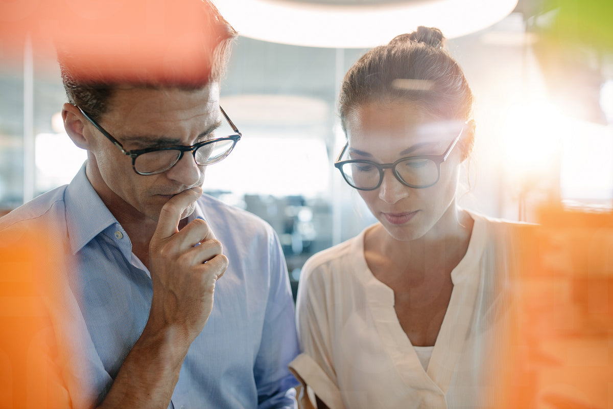 Colleagues thinking on new business ideas in office – Jacob Lund ...