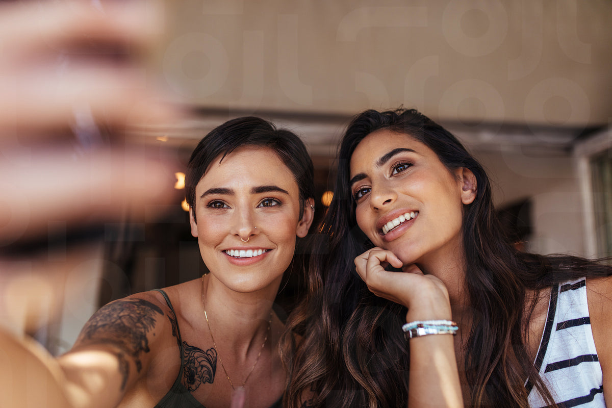 Women taking selfie – Jacob Lund Photography Store- premium stock photo