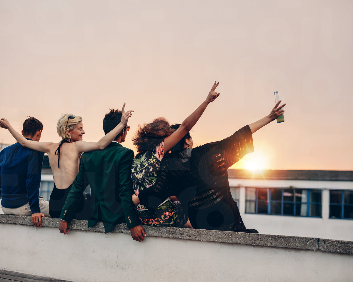 Young people partying on terrace with drinks – Jacob Lund Photography ...