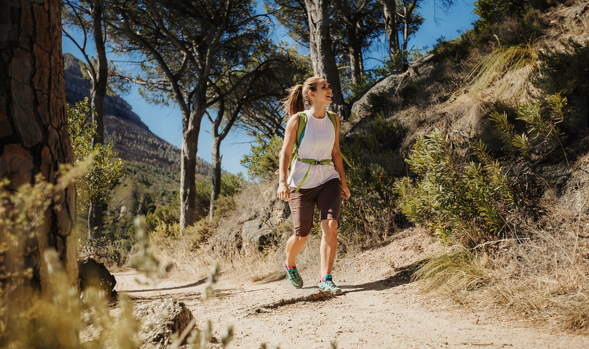 Woman hiking on a mountain trail – Jacob Lund Photography Store ...