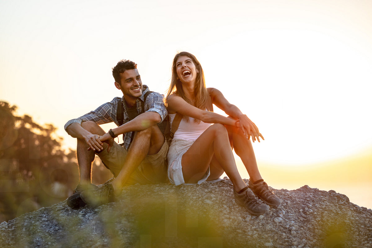 Laughing couple taking a break on a hike – Jacob Lund Photography Store ...