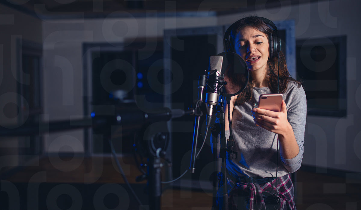 Female playback singer with mobile phone – Jacob Lund Photography Store ...
