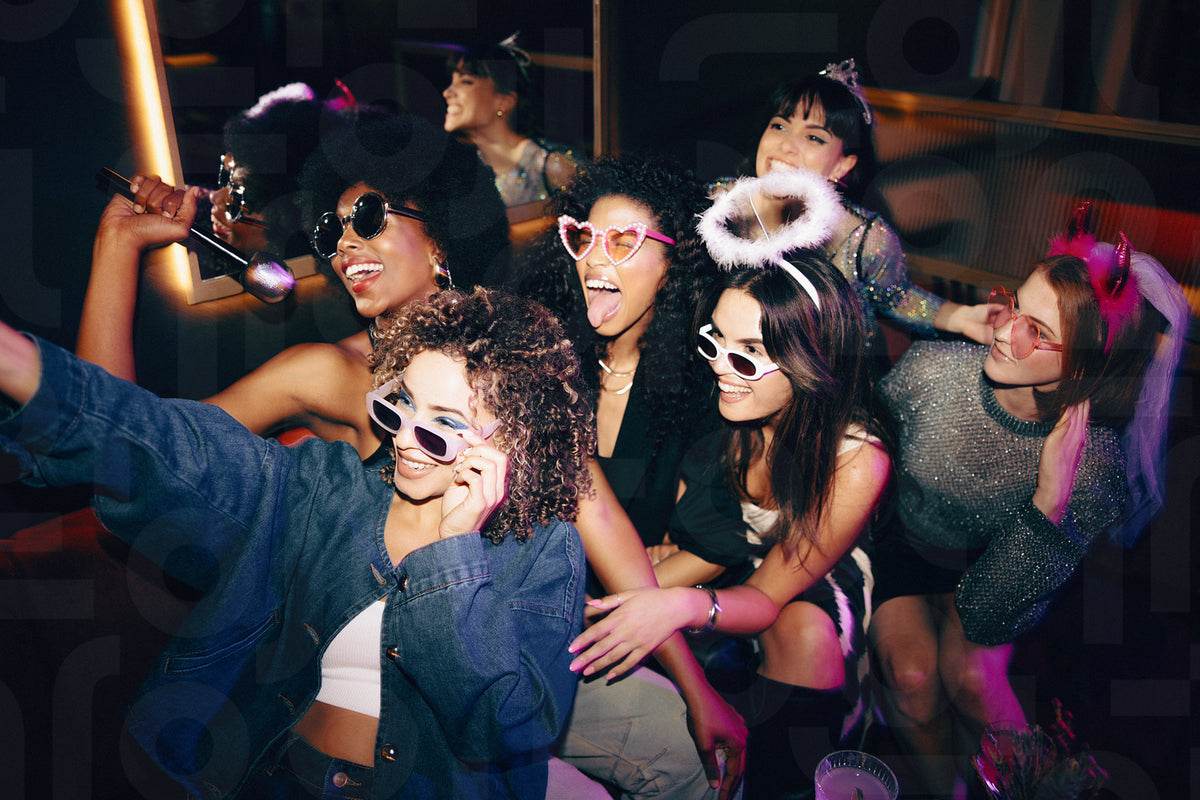 Group of joyful friends enjoying a lively night out together – Jacob ...
