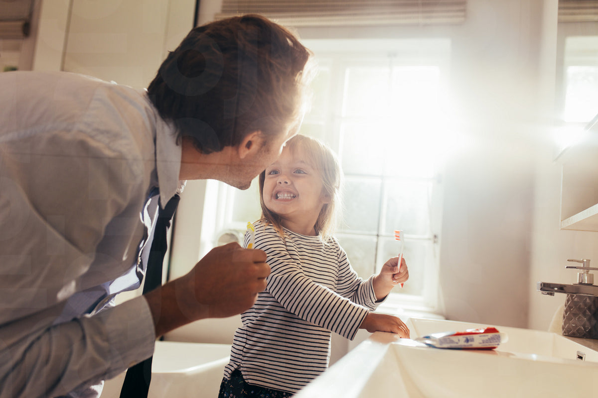 Father teaching daughter how to brush teeth – Jacob Lund Photography ...