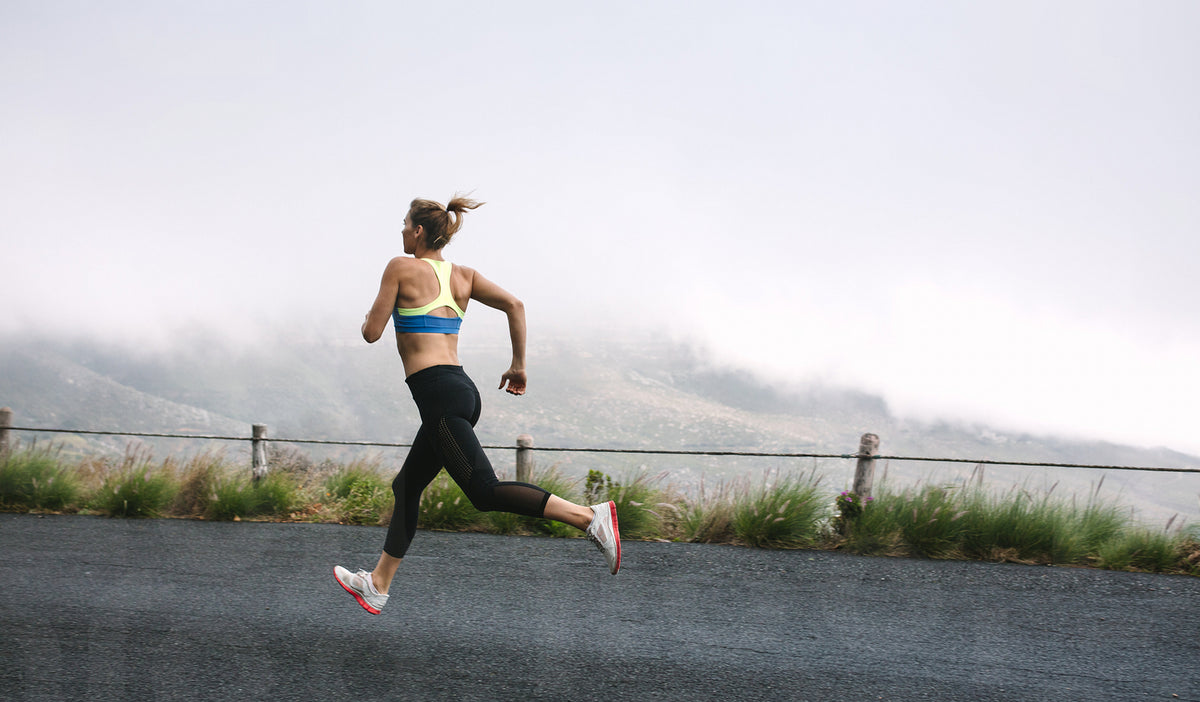 Woman athletes running on road – Jacob Lund Photography Store- premium ...