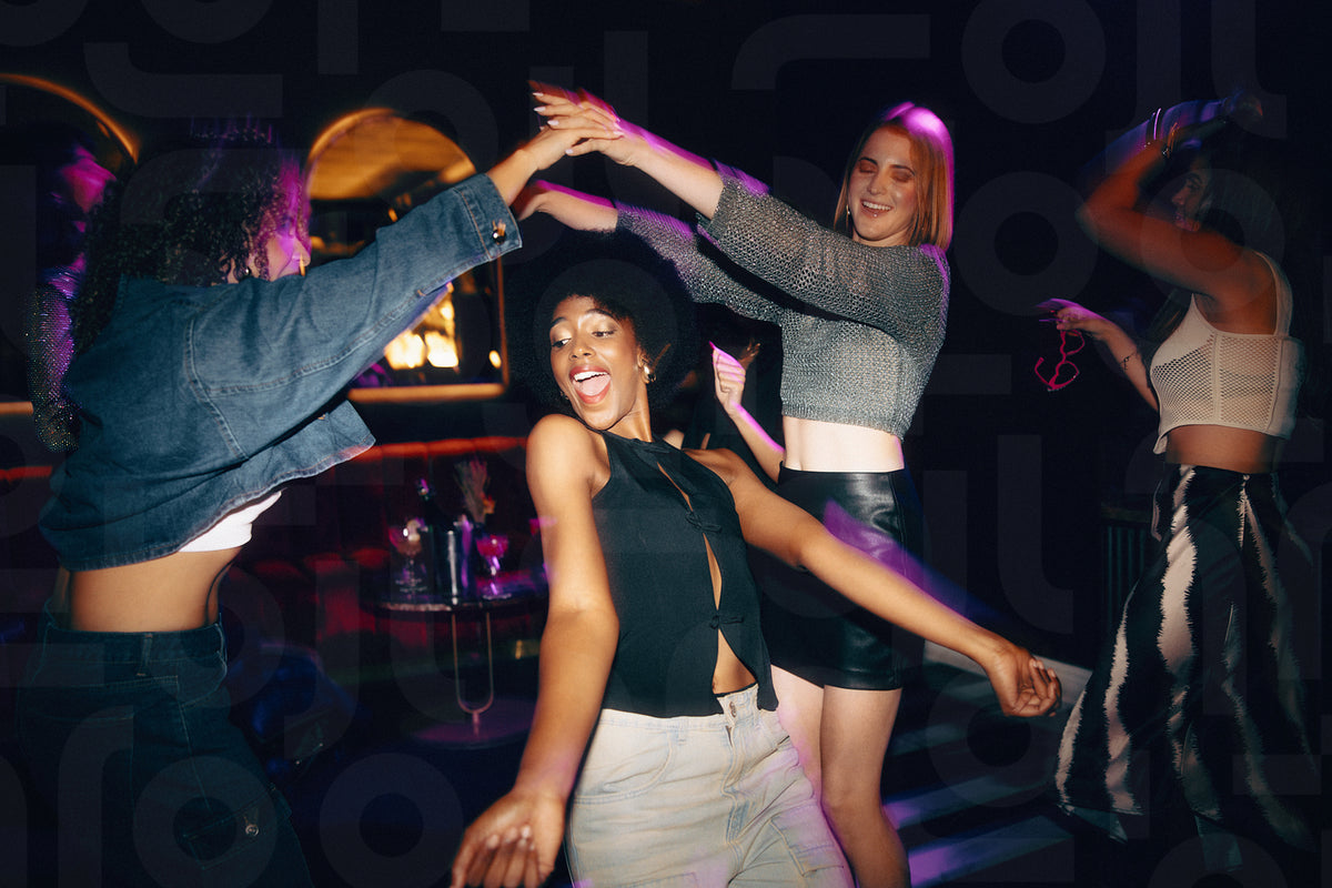 Group of friends dancing together in a lively nightclub setting – Jacob ...