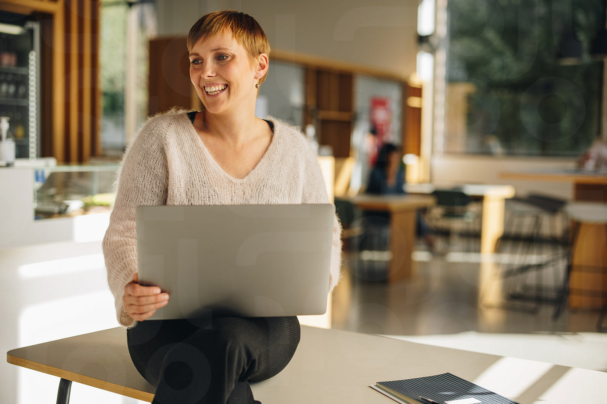 Freelancer with laptop in coworking space – Jacob Lund Photography ...