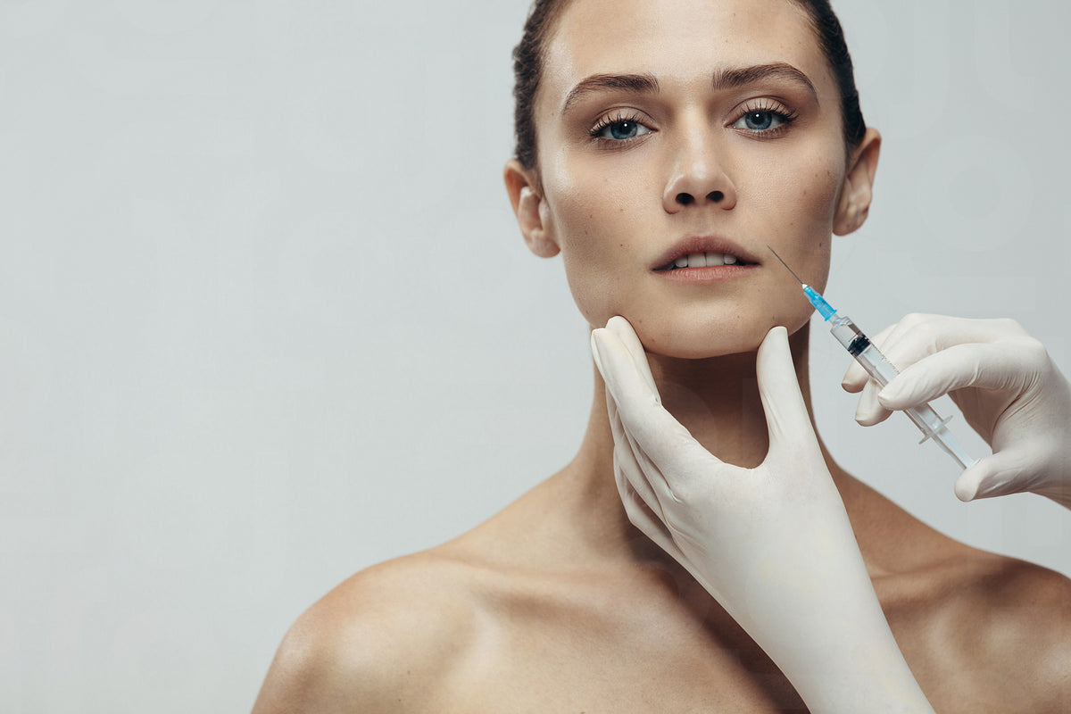Woman getting cosmetic injection – Jacob Lund Photography Store ...