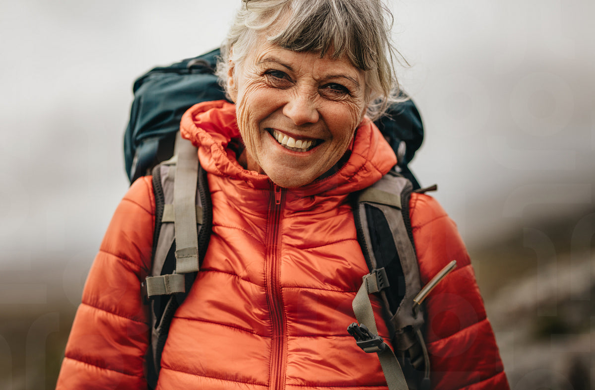 Portrait of a smiling woman on a hiking trip – Jacob Lund Photography ...