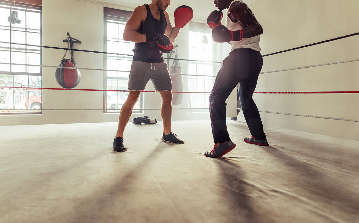 Boxer training with his coach in a boxing ring – Jacob Lund Photography ...