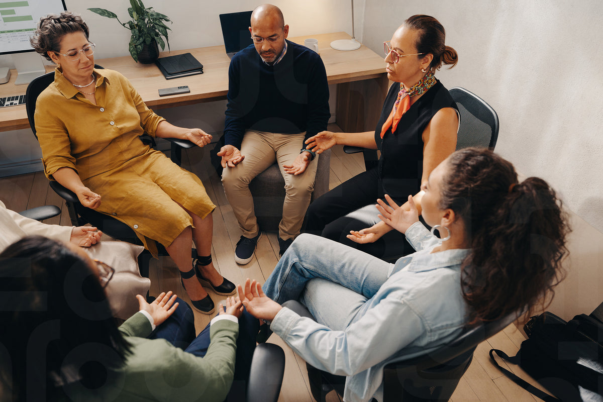 Team wellness activity featuring a breathing exercise in an office set ...