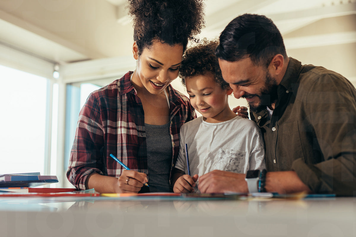 Man and woman helping child in writing – Jacob Lund Photography Store ...