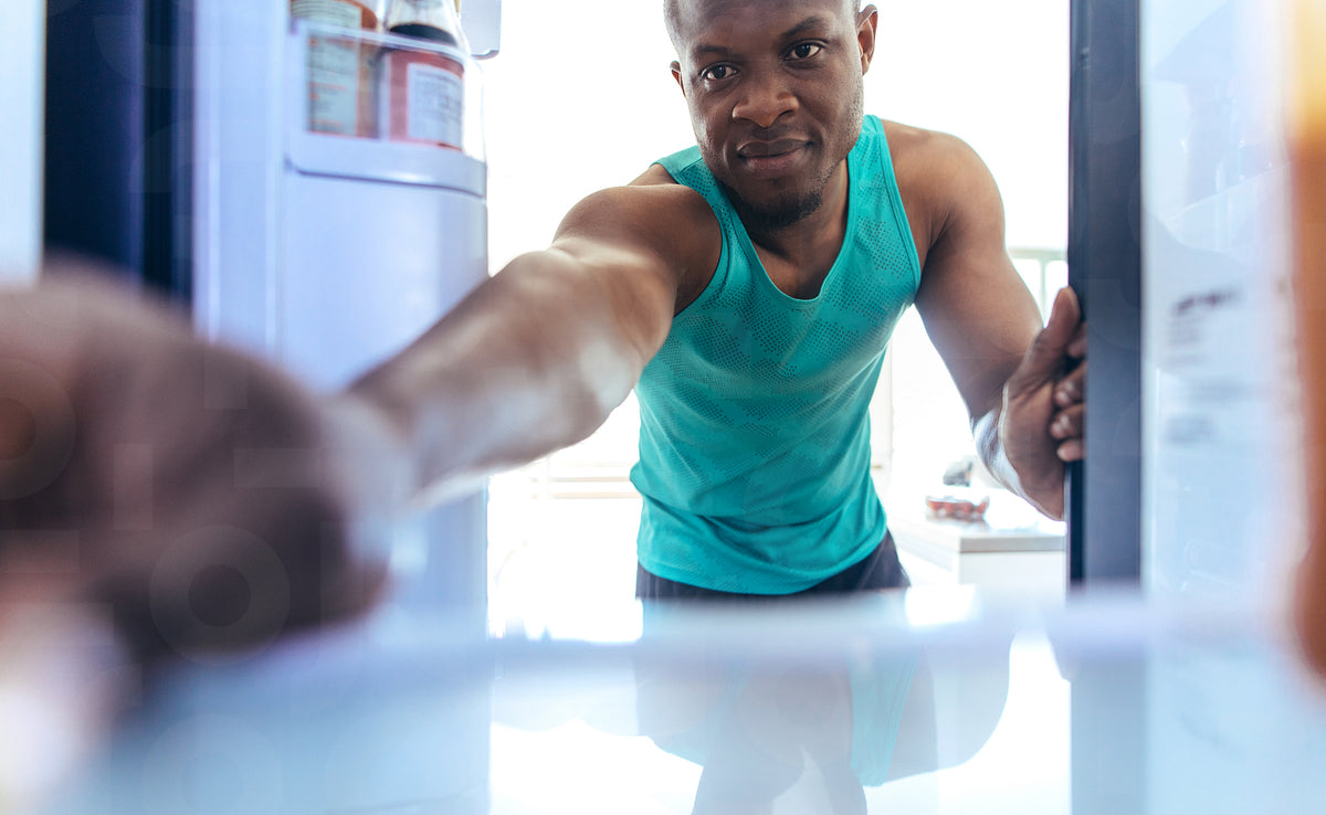 Man using refrigerator at home – Jacob Lund Photography Store- premium ...