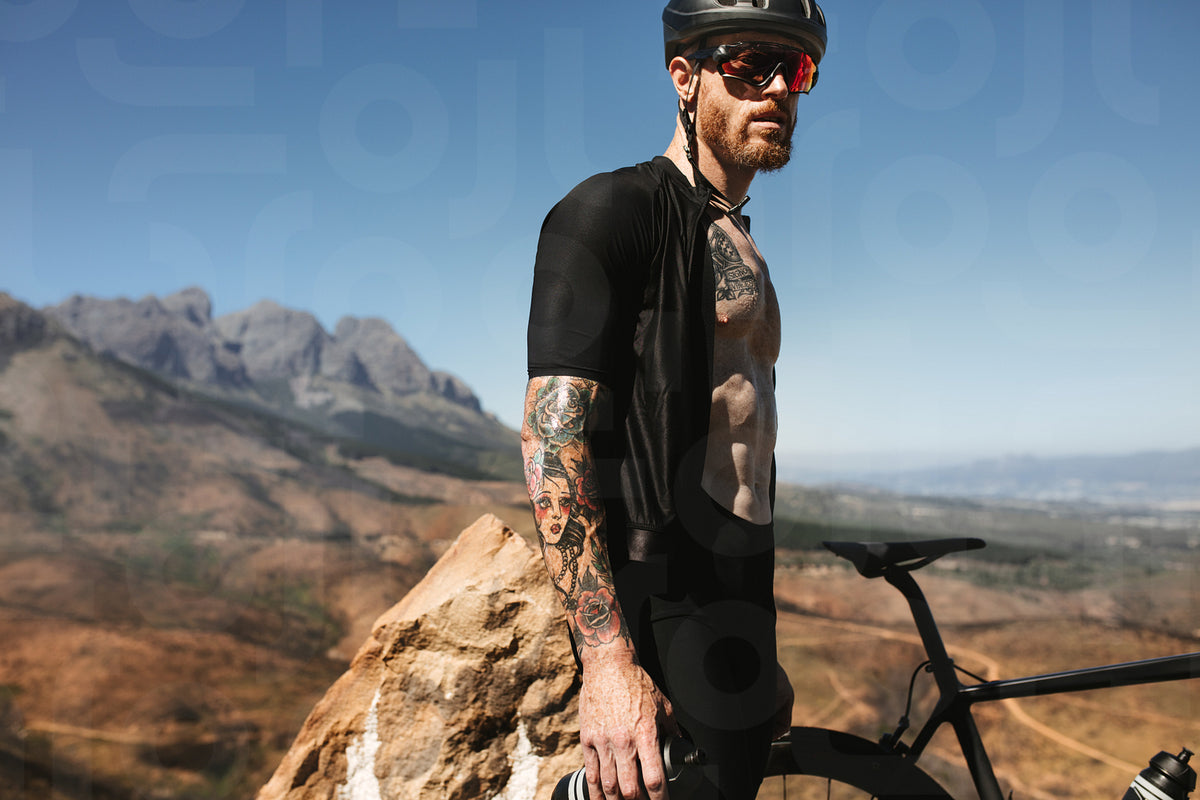 Exhausted cyclist taking break – Jacob Lund Photography Store- premium ...