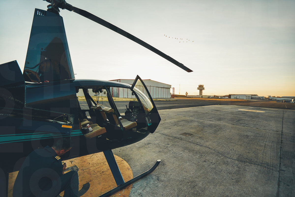 Pilot doing pre flight inspection at helicopter – Jacob Lund ...