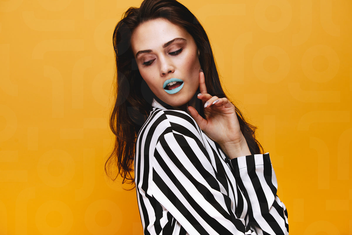 Fashionable model posing in studio – Jacob Lund Photography Store ...