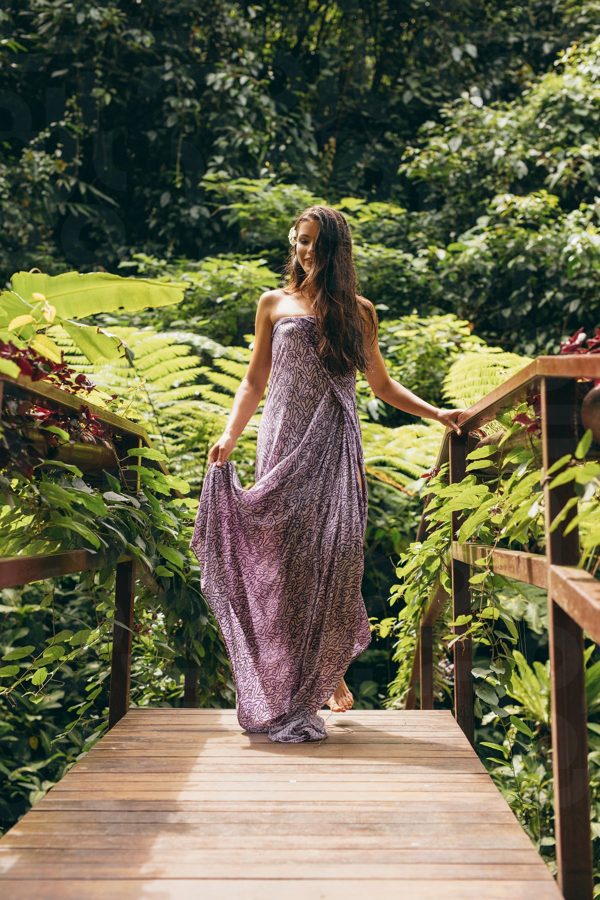 Attractive woman in a dress walking on small bridge – Jacob Lund ...