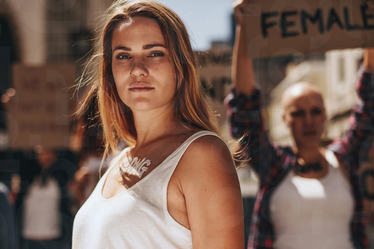Strong young female activist protesting – Jacob Lund Photography Store ...