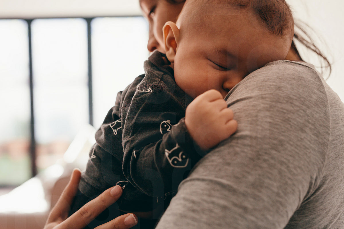 Close up of a woman carrying her sleeping baby – Jacob Lund Photography ...