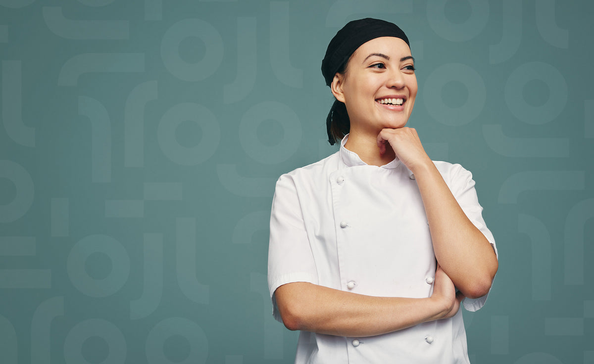Happy culinary chef smiling cheerfully in a studio – Jacob Lund ...