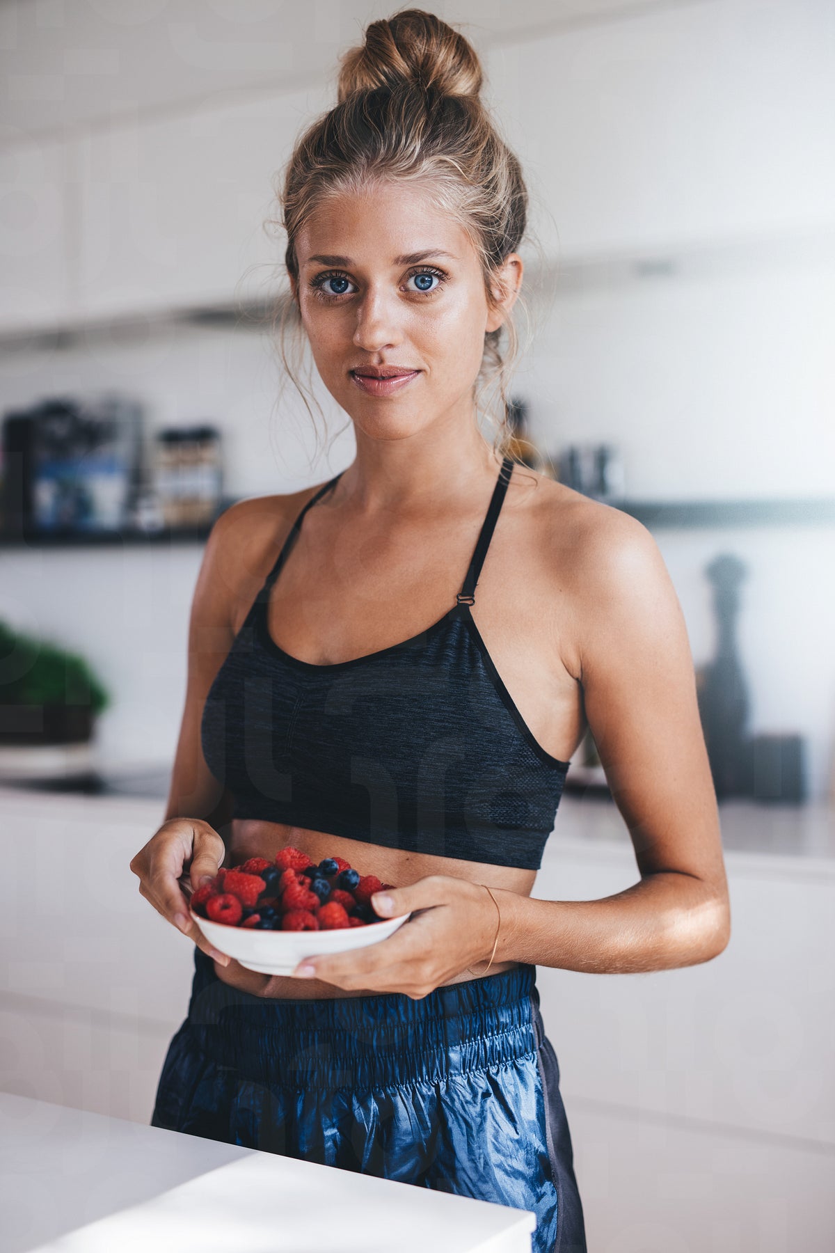 Woman having healthy breakfast in kitchen – Jacob Lund Photography ...
