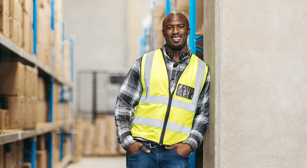 Portrait of a warehouse picker smiling at the camera – Jacob Lund ...