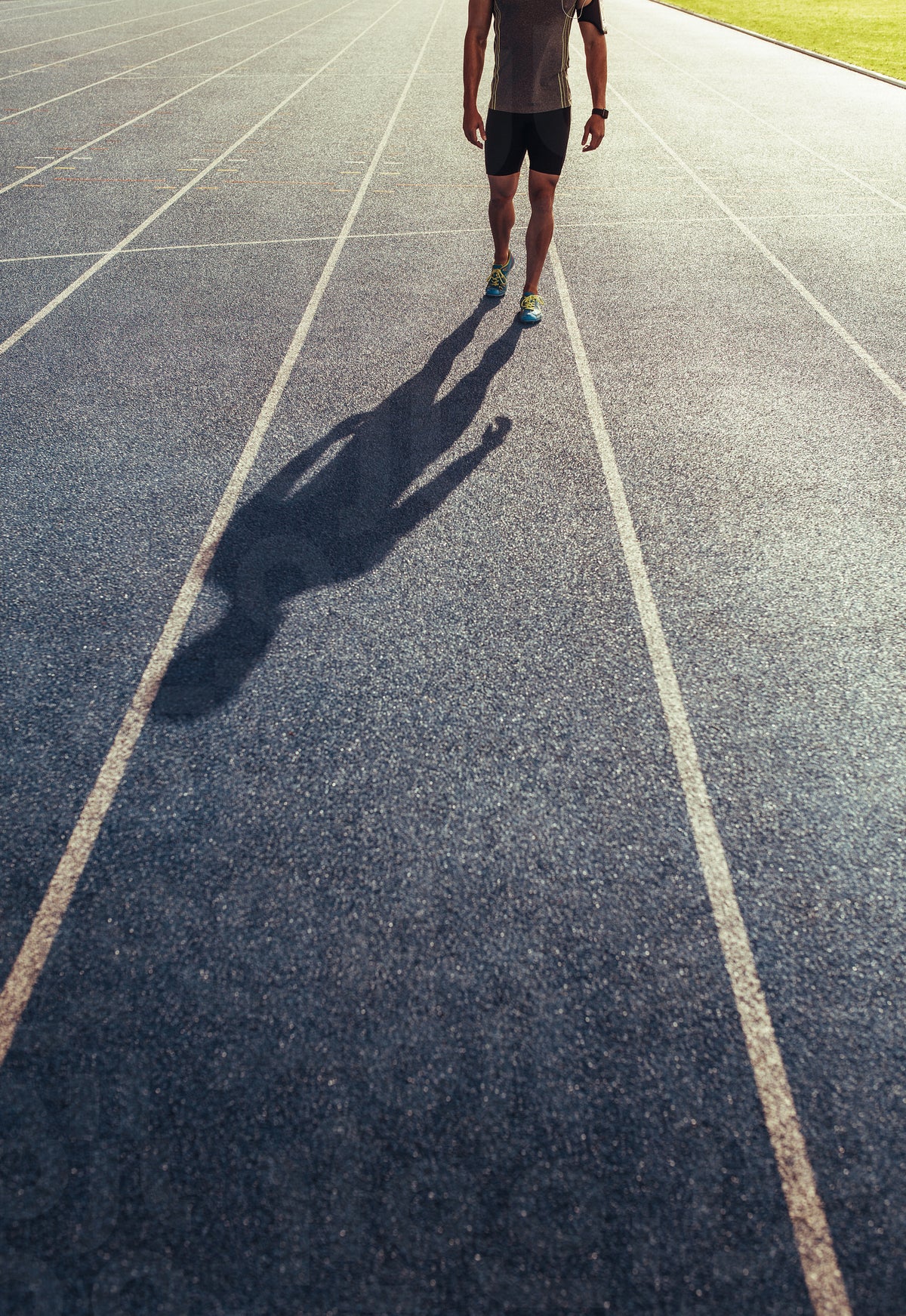 Sprinter walking on running track – Jacob Lund Photography Store ...