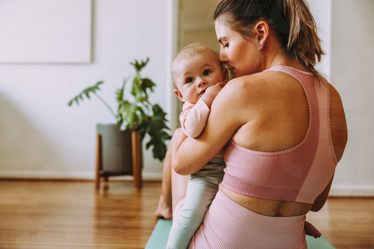 Caring mom working out with her baby at home – Jacob Lund Photography ...