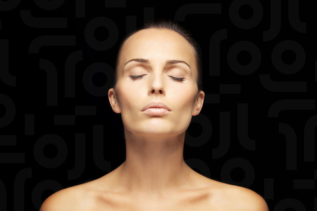 Serene young woman on black background – Jacob Lund Photography Store ...