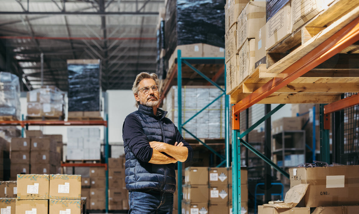 Senior warehouse manager looking thoughtful – Jacob Lund Photography ...