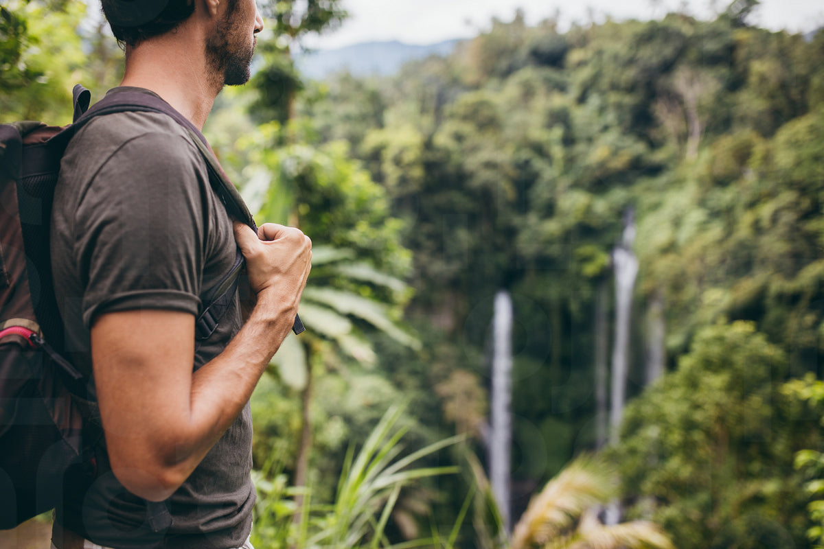 Male hiker near waterfall in forest – Jacob Lund Photography Store ...