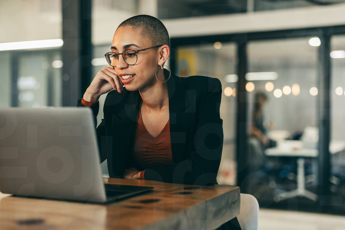 Young businesswoman attending a virtual meeting in an office – Jacob ...