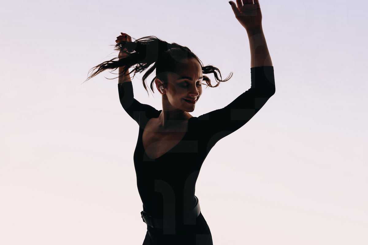 Happy female dancer celebrating with body movements in a studio – Jacob ...